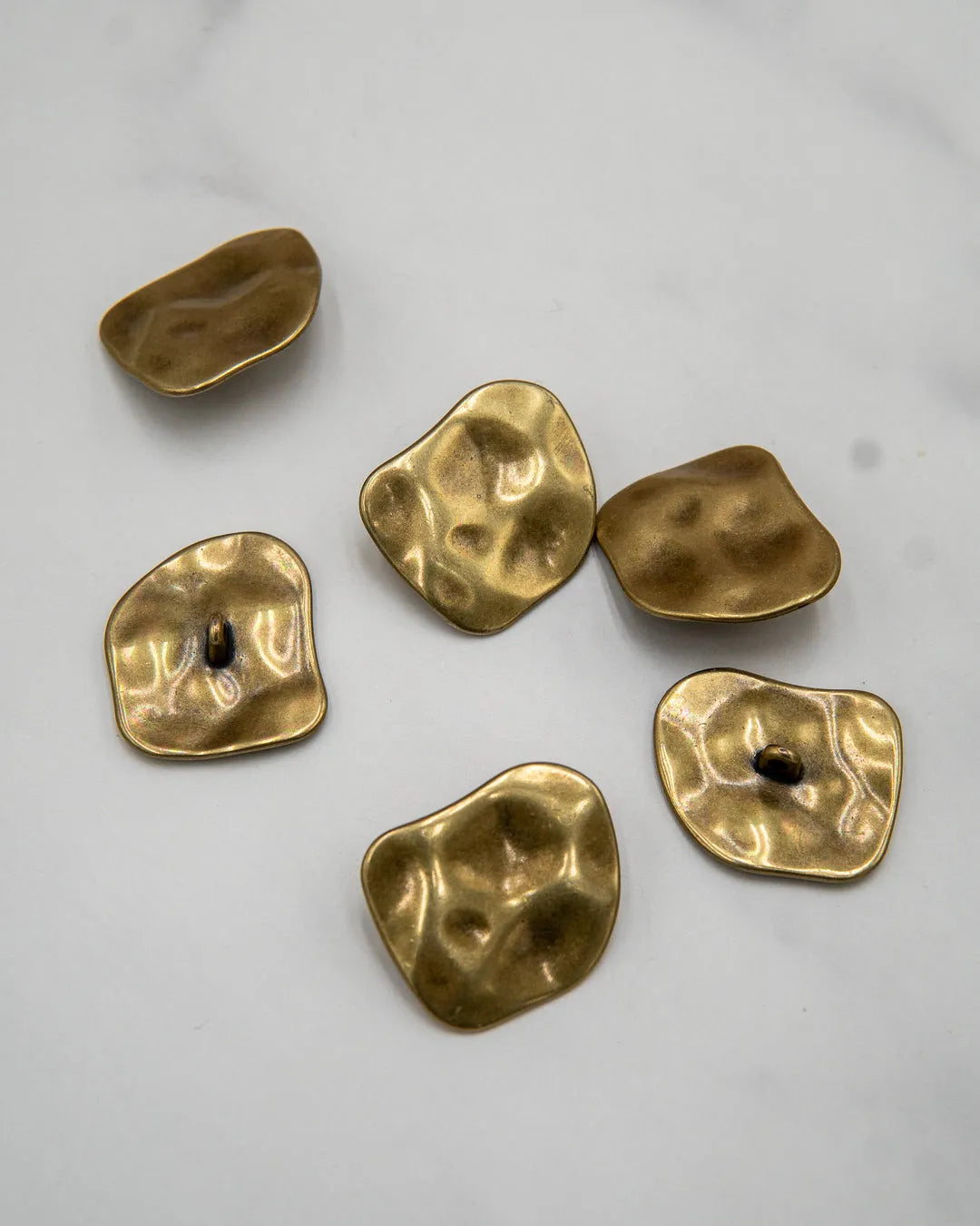 Irregular shaped "old brass" style metal buttons with shank - 1 inch
